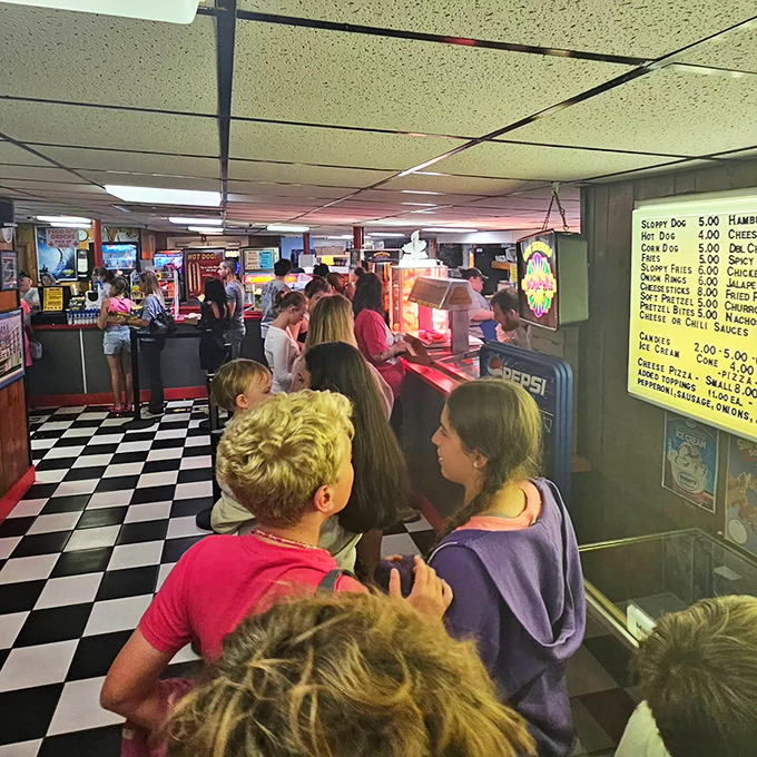 The concession stand line buzzes with anticipation &ndash; half the fun is deciding between classic movie snacks in this time-capsule setting.