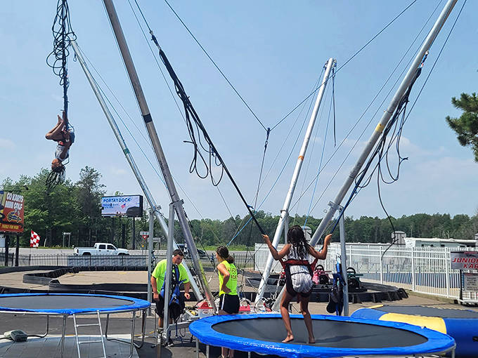 Defying gravity with a smile! The bungee trampoline experience lets visitors soar higher than they ever thought possible.