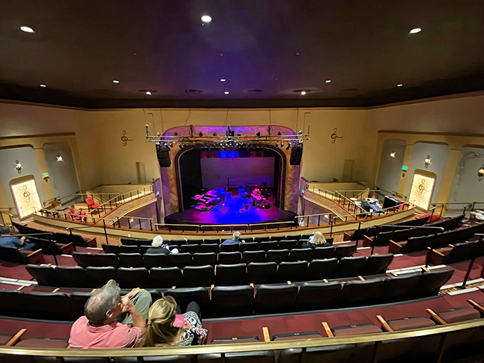 From the balcony, every seat offers that perfect blend of panoramic view and intimate connection to the performers below.