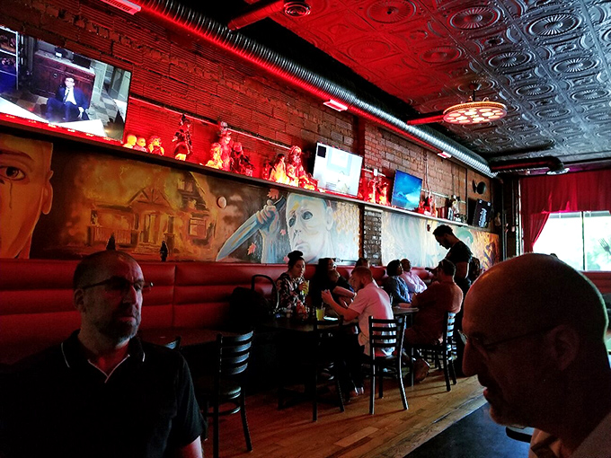 Red lighting bathes the dining room in an otherworldly glow, turning an ordinary lunch into a scene from your favorite horror flick.