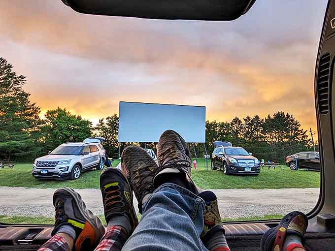 The ultimate drive-in luxury: stretching out in the back of your vehicle with blankets, snacks, and an unobstructed view.