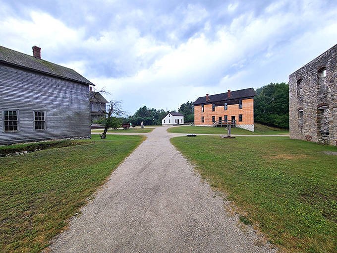 Gravel pathways connect the ghosts of Michigan's industrial past, leading visitors through a living history book.