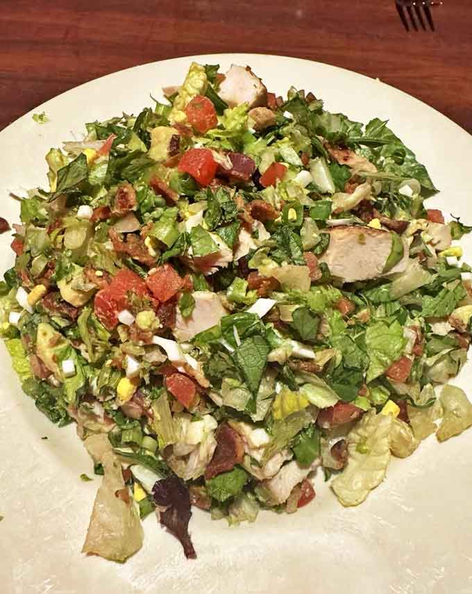 The Cobb salad arrives like edible artwork &ndash; a colorful composition of ingredients that makes eating vegetables feel like a reward.