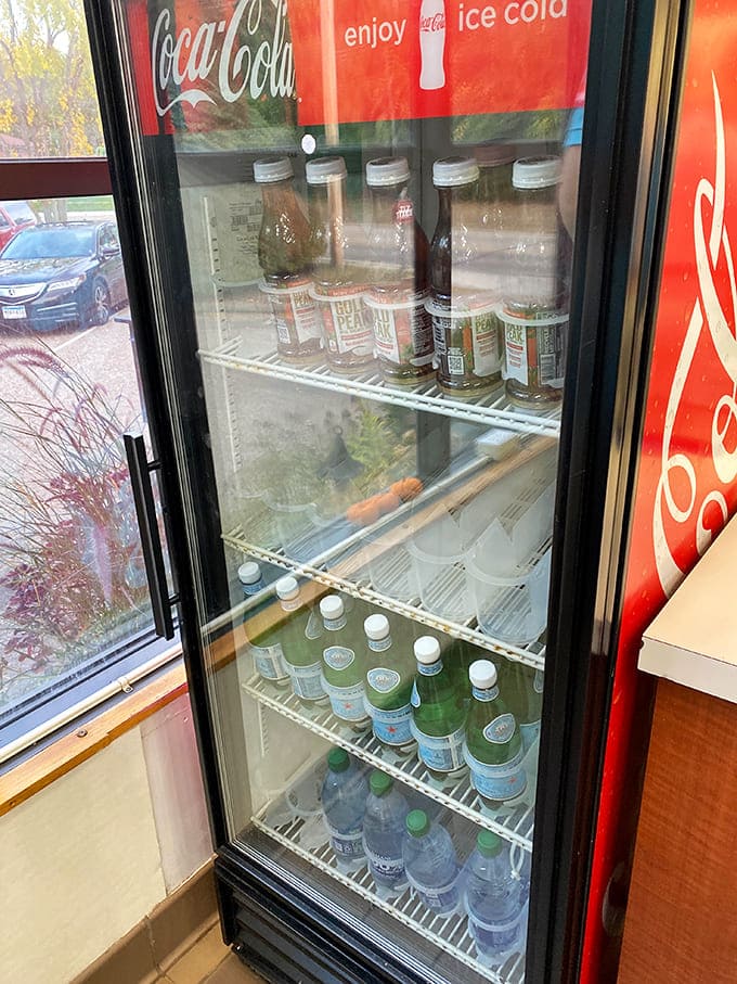 Even the beverage cooler looks inviting, offering refreshments for those brave souls who choose drinks over more custard.
