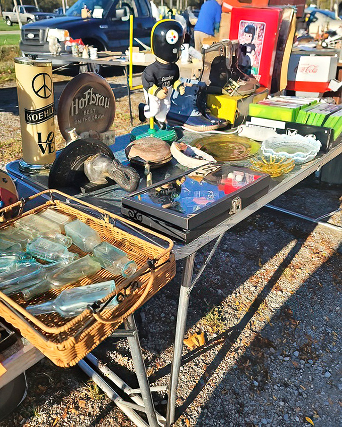 Steelers memorabilia sits alongside vintage glassware – the perfect booth for sports fans and collectors alike to discover their next conversation piece.