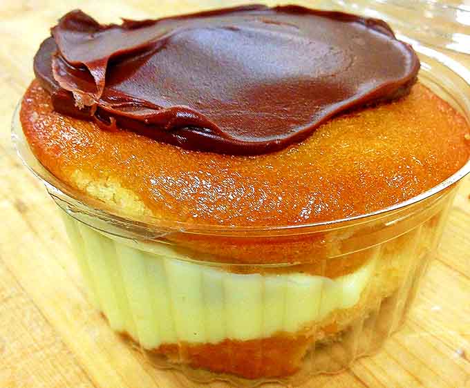Layers of cake, cream, and chocolate ganache come together in this Boston cream pie that'll make you question why gluten ever thought it was so important.
