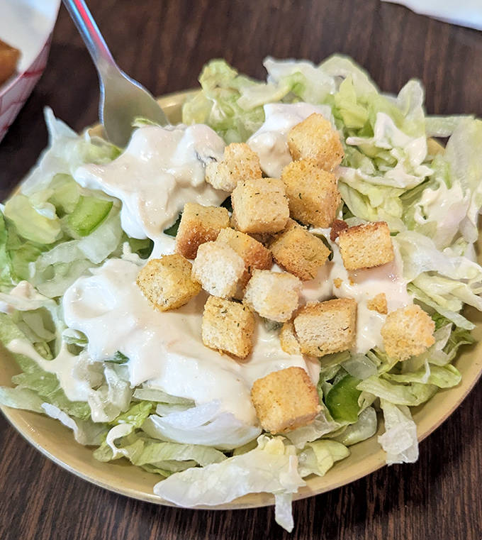 Even the salad gets special treatment &ndash; crisp lettuce, golden croutons, and dressing that wasn't born in a bottle.