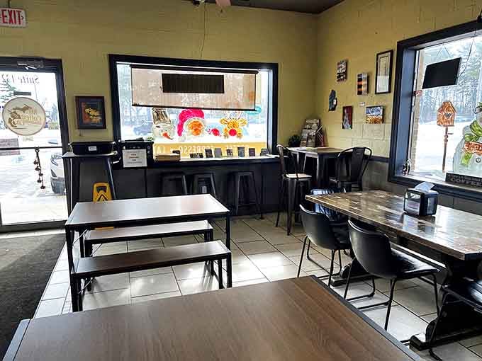 The caf&eacute;'s minimalist seating area somehow manages to feel both spacious and intimate &ndash; a rare public space that invites both productivity and relaxation.