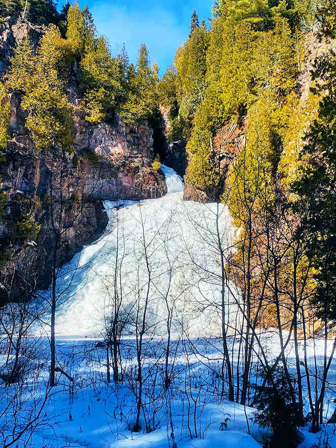 Winter transforms Caribou Falls into a frozen fantasy world, with ice sculptures that seem to defy both gravity and imagination.