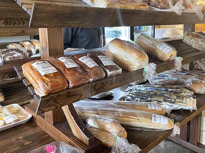 The bread shelf at Carl's, where every loaf is a potential life-changing experience wrapped in plastic and waiting for you.