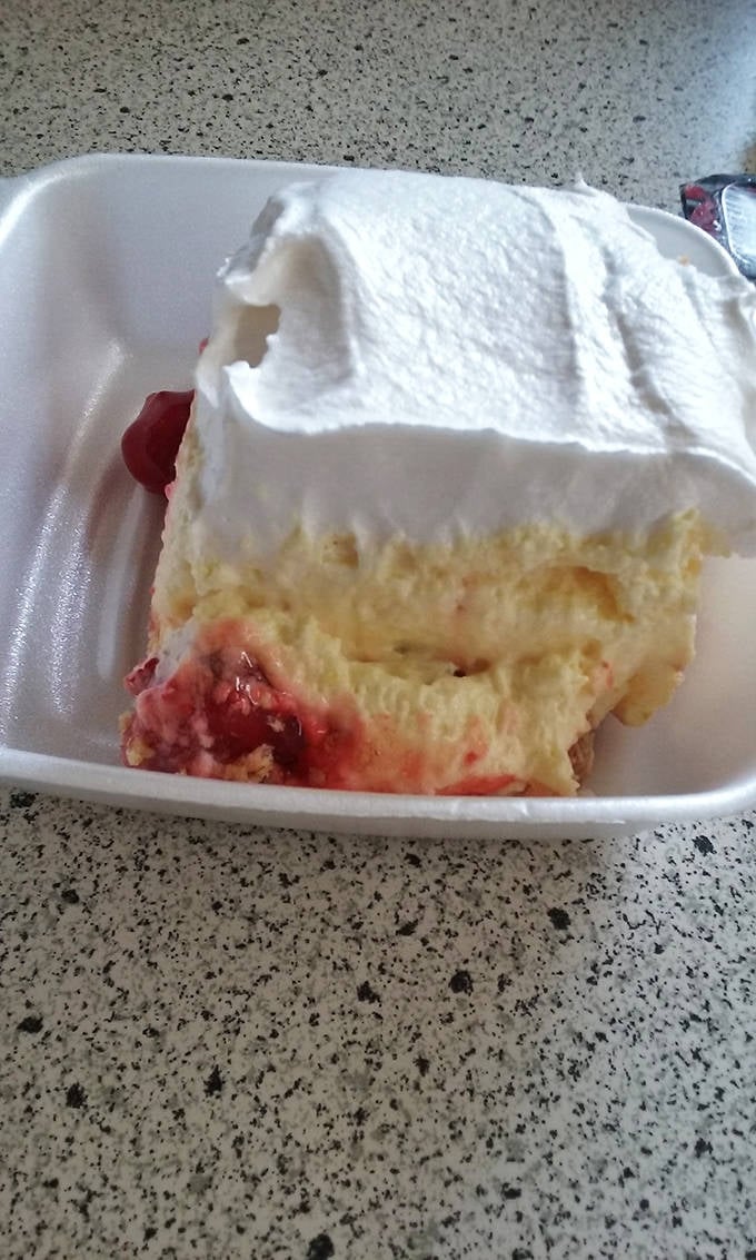 The cherry delight dessert doesn't need fancy plating or edible flowers &ndash; its cloud-like cream and vibrant filling speak volumes without saying a word.