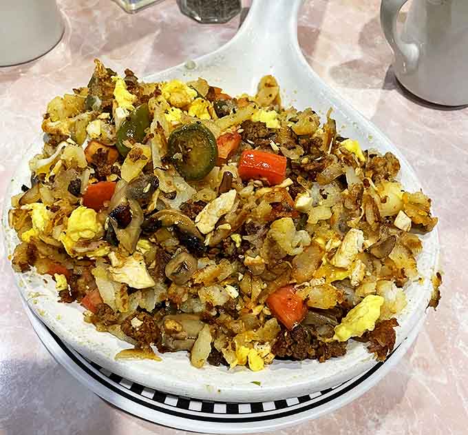 The chicken chorizo skillet brings together eggs, potatoes, and vegetables in a cast-iron masterpiece that keeps sizzling until the last bite.