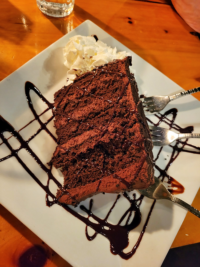 Chocolate cake that makes sharing seem like a terrible idea &ndash; rich layers drizzled with sauce that has sparked many a dessert-related negotiation.