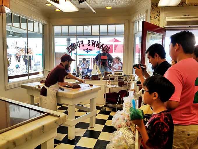 The fudge-making performance draws crowds like a sugary spectacle &ndash; part culinary craft, part theater, all delicious.