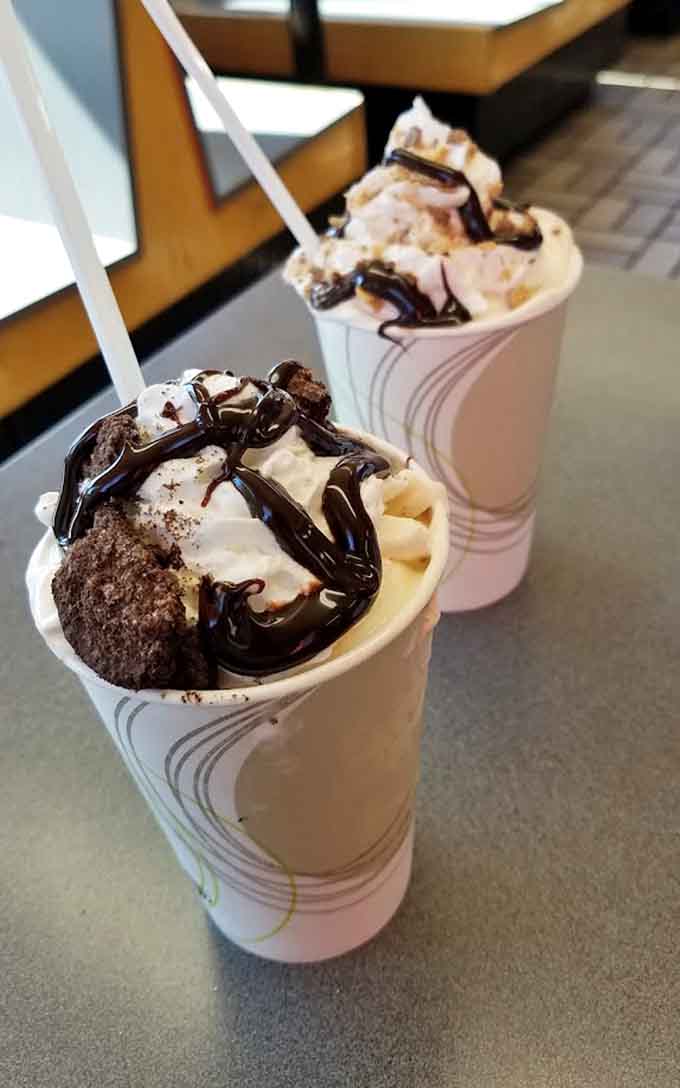 Two towering milkshakes drizzled with chocolate sauce&mdash;because if you're going to indulge, you might as well go all in.