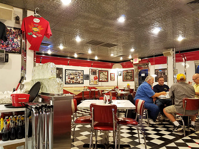 The diner's interior showcases decades of Minnesota memories on its walls, while regulars create new ones at those timeless tables.