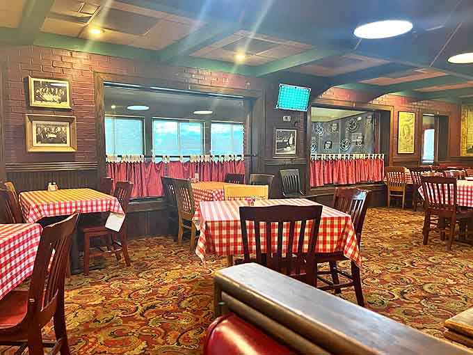 The dining area remains virtually unchanged over decades, with simple tables where countless elbows have rested.