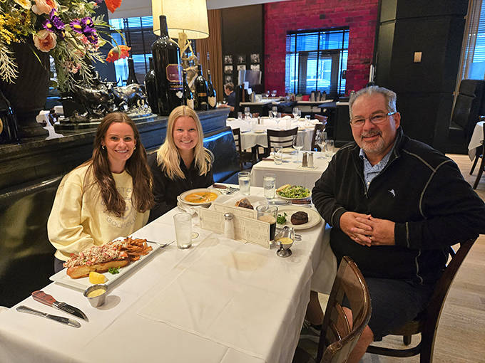 Happy diners experiencing the Manny's magic &ndash; where memories are made one spectacular bite at a time.