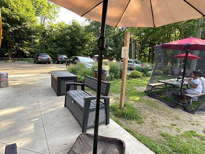 The waiting area becomes part of the experience, as anticipation builds while watching others walk away with their perfectly crafted hot dogs.