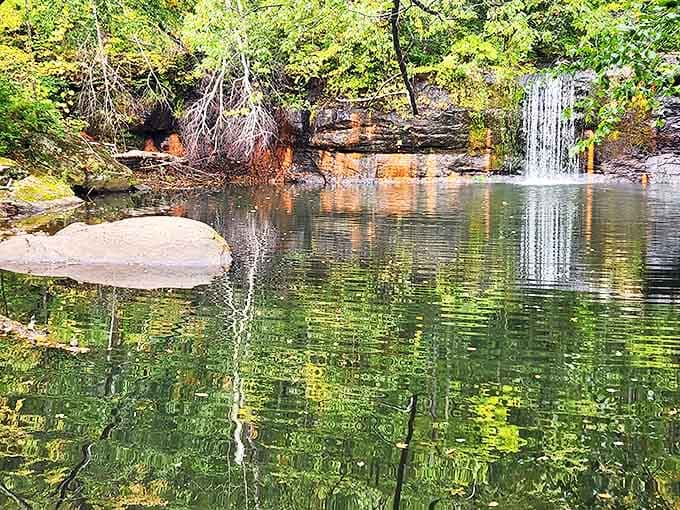 Summer's lush greenery frames the falls in a different light, proving this hidden gem changes its personality with each passing season.