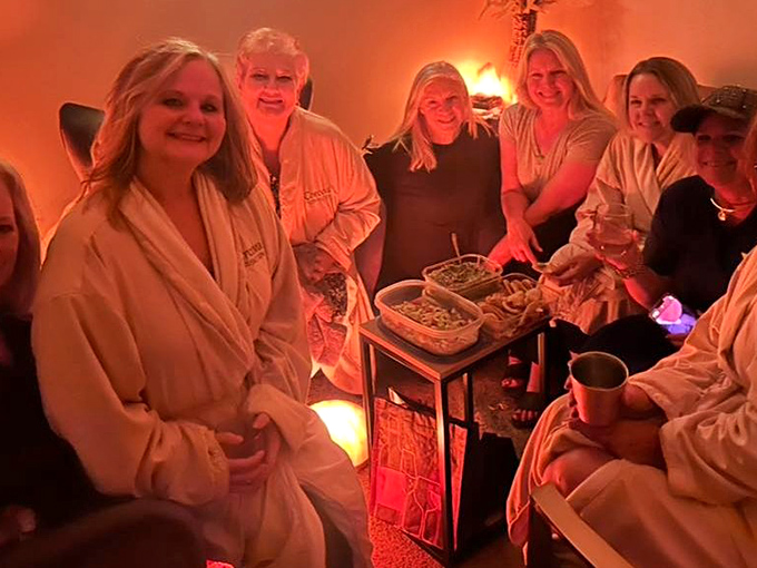 Friends gather in the communal salt room, where conversation flows easily in the negative-ion-rich environment.