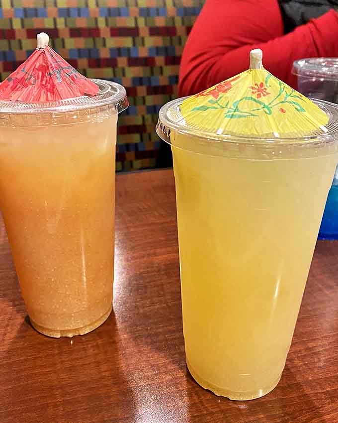 These aren't just drinks; they're liquid sunshine in cups, topped with tiny umbrellas that somehow make everything taste better.