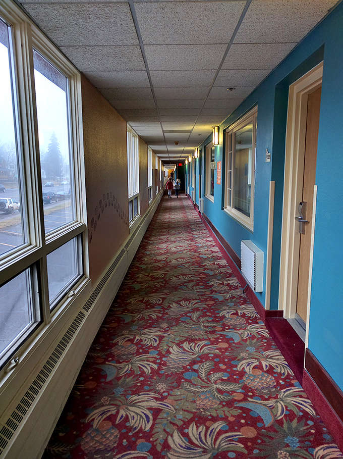 Hallways with nautical-themed carpeting cleverly disguise inevitable water drips while cushioning the feet of excited swimmers heading to their next adventure.