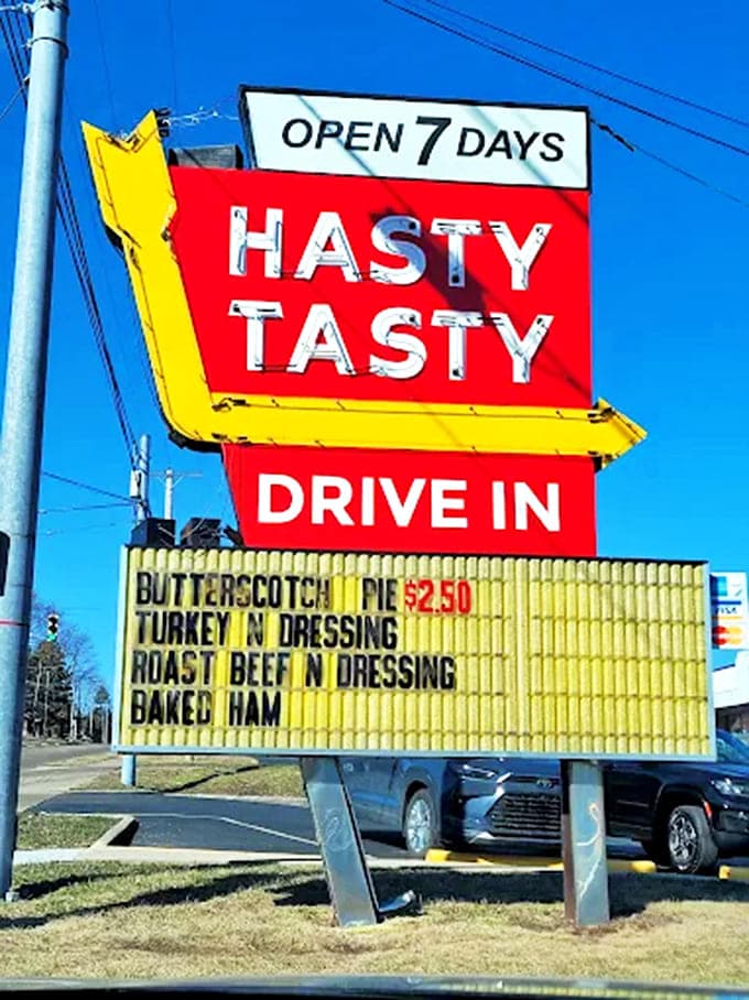 The marquee announces daily specials like a town crier, tempting drivers with promises of butterscotch pie and comfort food that actually delivers.