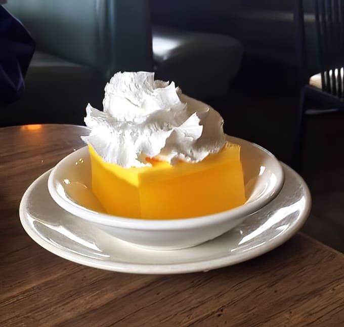 Simple jello with whipped cream proves that sometimes the most humble desserts deliver the most nostalgic pleasure.