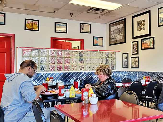 The dining room hums with conversation as regulars and newcomers alike surrender to the comfort of classic diner fare.