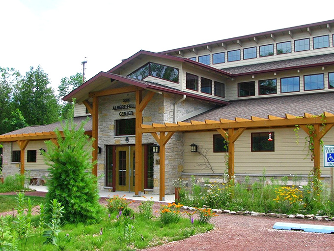 The visitor center&rsquo;s brick exterior, shaded by trees along the side, creates a welcoming spot where visitors can explore the sanctuary&rsquo;s natural history through fun, interactive displays.