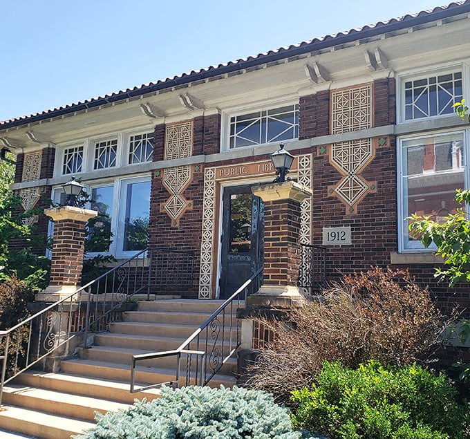 Milan Public Library's 1912 terra cotta detailing showcases an era when even everyday buildings were crafted with artistic intention.