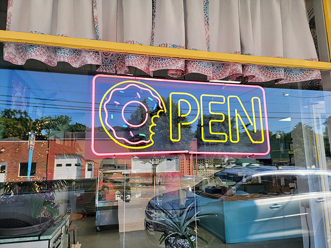 That neon "OPEN" sign isn't just an invitation &ndash; it's a beacon of hope for anyone having a rough day or a sugar craving.