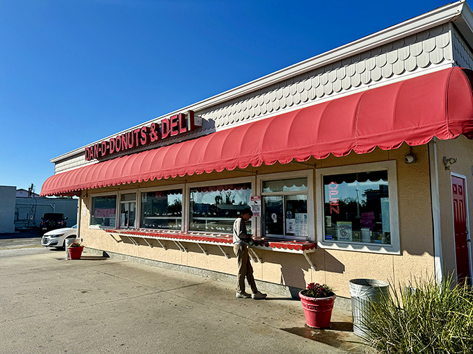 Where donut dreams come true &ndash; the order window where friendly faces greet you and difficult decisions about frosting flavors must be made.