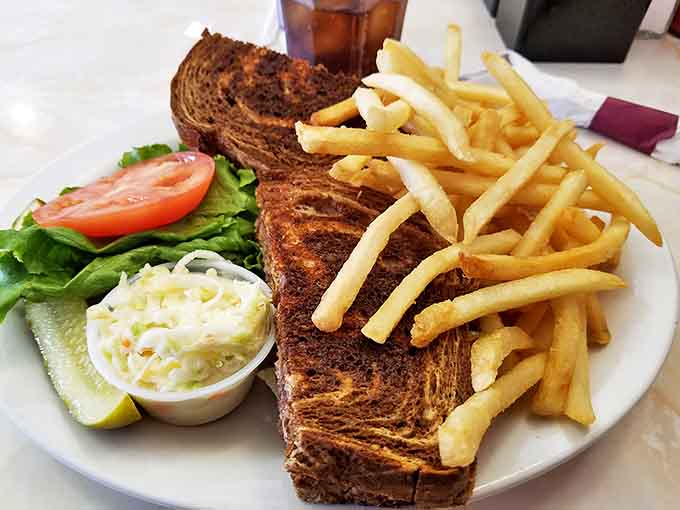This patty melt doesn't just satisfy hunger &ndash; it obliterates it with grilled rye, melted cheese, and a burger patty cooked to perfection.