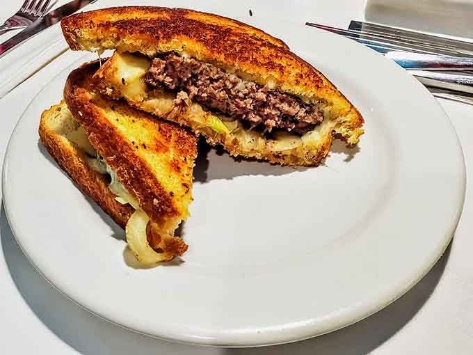 The Patty Melt &ndash; where caramelized onions, melted Swiss, and perfectly seasoned beef meet on grilled rye bread for a flavor summit of international importance.