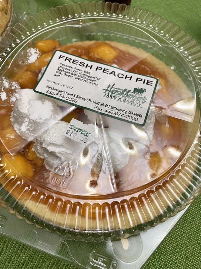 Fresh peach pie bursting with fruit and topped with a lattice crust that's almost too pretty to eat, but you'll manage somehow.