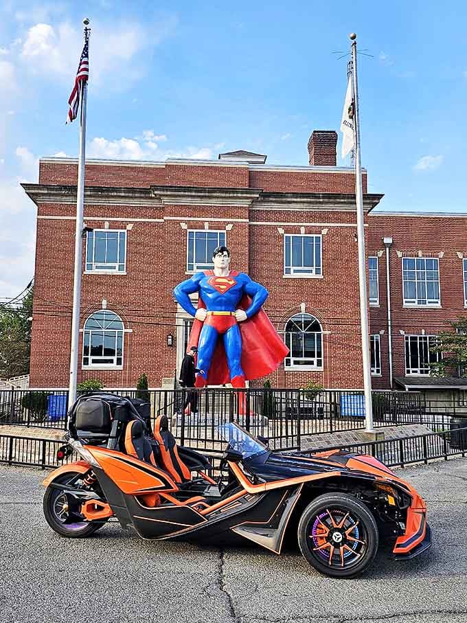 This eye-catching Polaris Slingshot seems ready for superhero adventures, parked strategically for the perfect Superman photo opportunity.