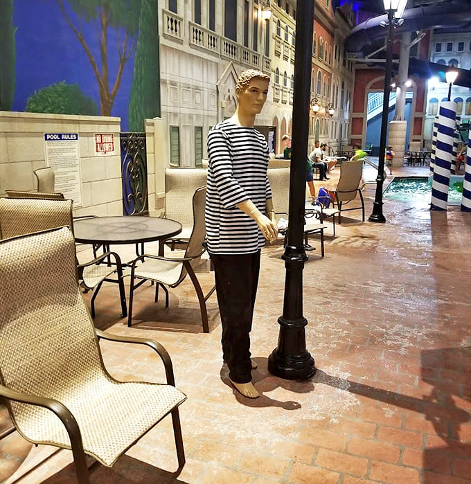 Even the mannequins can't resist the charm of this Italian-inspired oasis where striped poles stand sentinel over chlorinated canals.