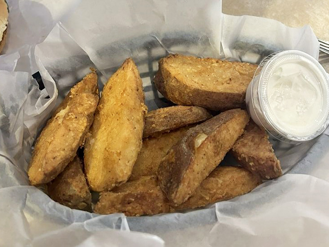 Potato Wedges Not quite fries, not quite baked potatoes &ndash; these golden wedges exist in a delicious dimension all their own, with dipping sauce for good measure.