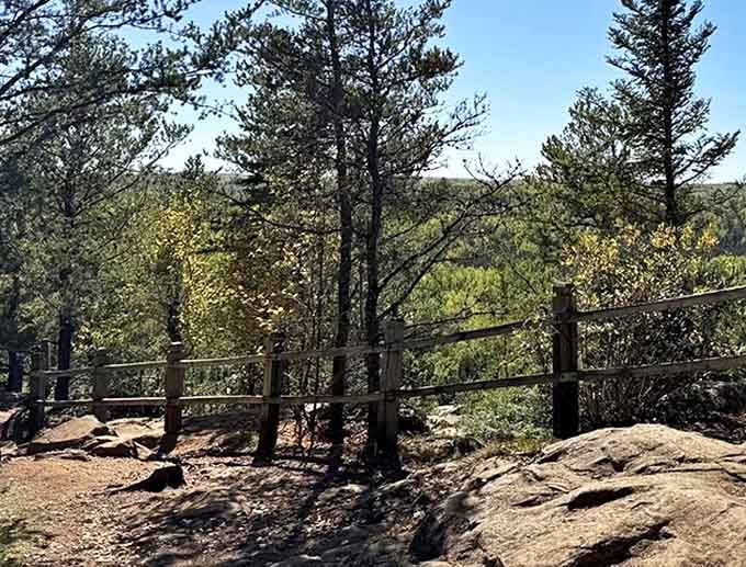 Rustic railings offer safety without sacrificing the wilderness vibe &ndash; like a gentle hand on your shoulder saying "Enjoy, but don't fall!"