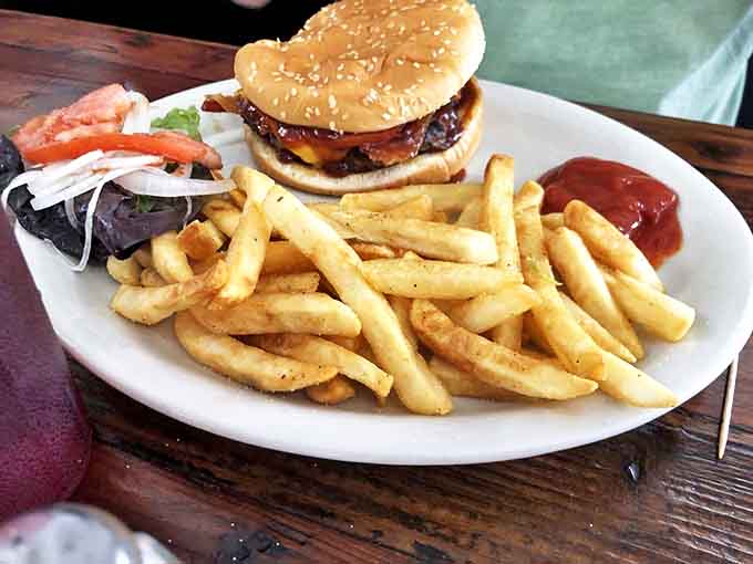 The Riches Royal Burger doesn't just satisfy hunger &ndash; it conquers it, with a juicy patty, melted cheese, and enough fries to feed a small nation.