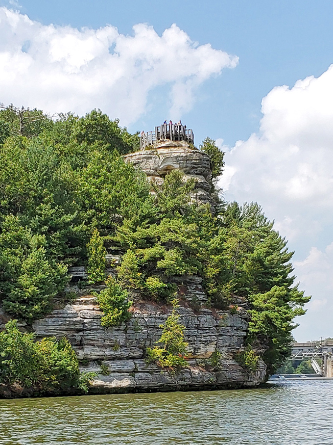 This rock formation stands like nature's castle turret, complete with its own observation deck for surveying the realm below.