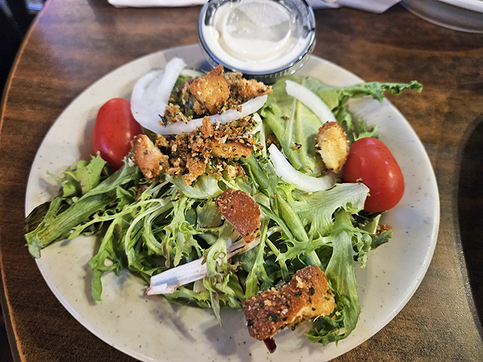 Even the salads at Crawfish Junction mean business &ndash; fresh greens topped with house-made croutons that crunch like autumn leaves.