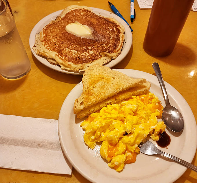 Scrambled eggs and toast – simple breakfast perfection that proves Al's mastery extends beyond their famous pancakes to every morning classic.