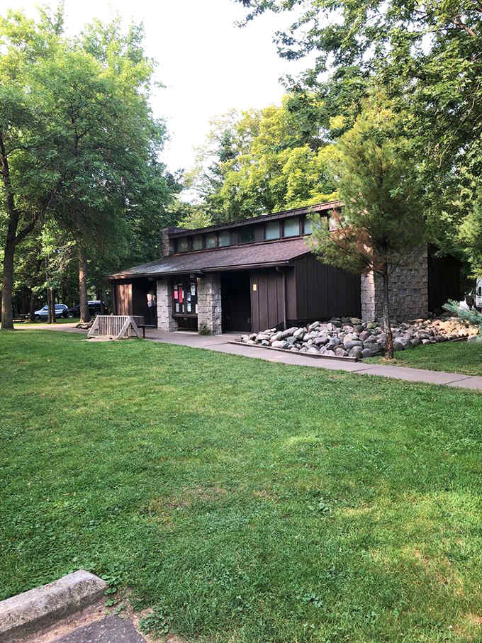 The park's rustic yet charming visitor center blends perfectly with its natural surroundings, welcoming travelers with its stone facade.