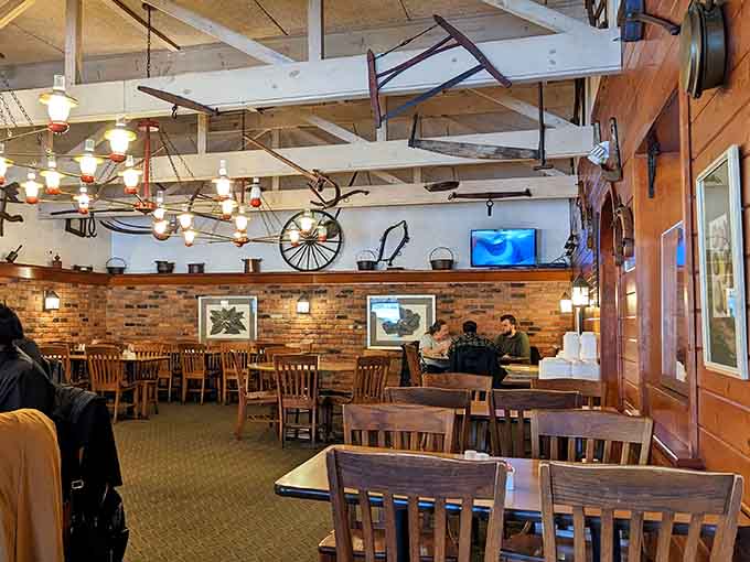 The spacious dining room with its wooden tables and vintage charm invites you to sit, relax, and enjoy your meal without rushing through the experience.