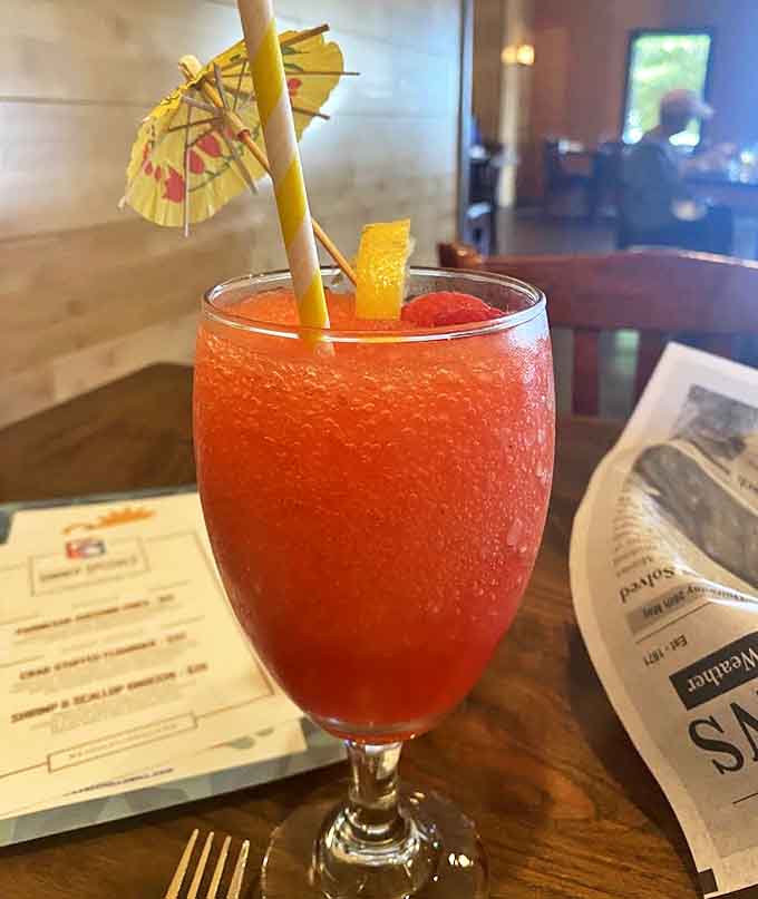 Ruby red vacation in a glass, complete with the mandatory tiny umbrella &ndash; because drinks should dress for the occasion too.