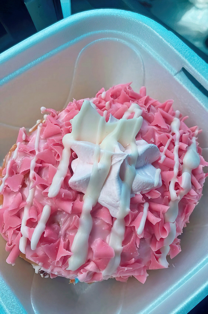The Strawberry Dream donut wears pink like it invented the color &ndash; a rosy vision topped with delicate white drizzle.