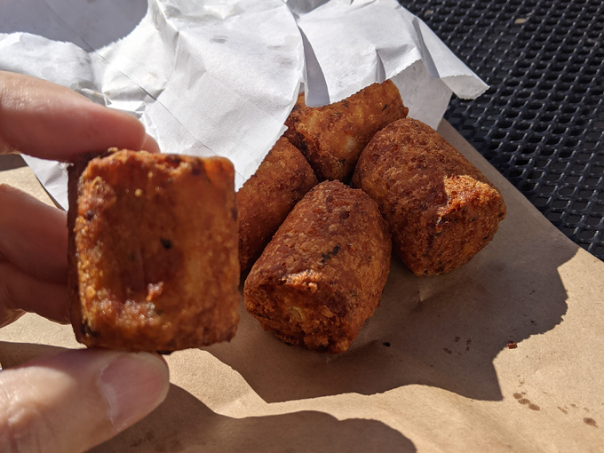 Wisconsin's famous cheese curds &ndash; golden-fried nuggets of joy that squeak when you bite them, nature's way of saying "you're welcome."